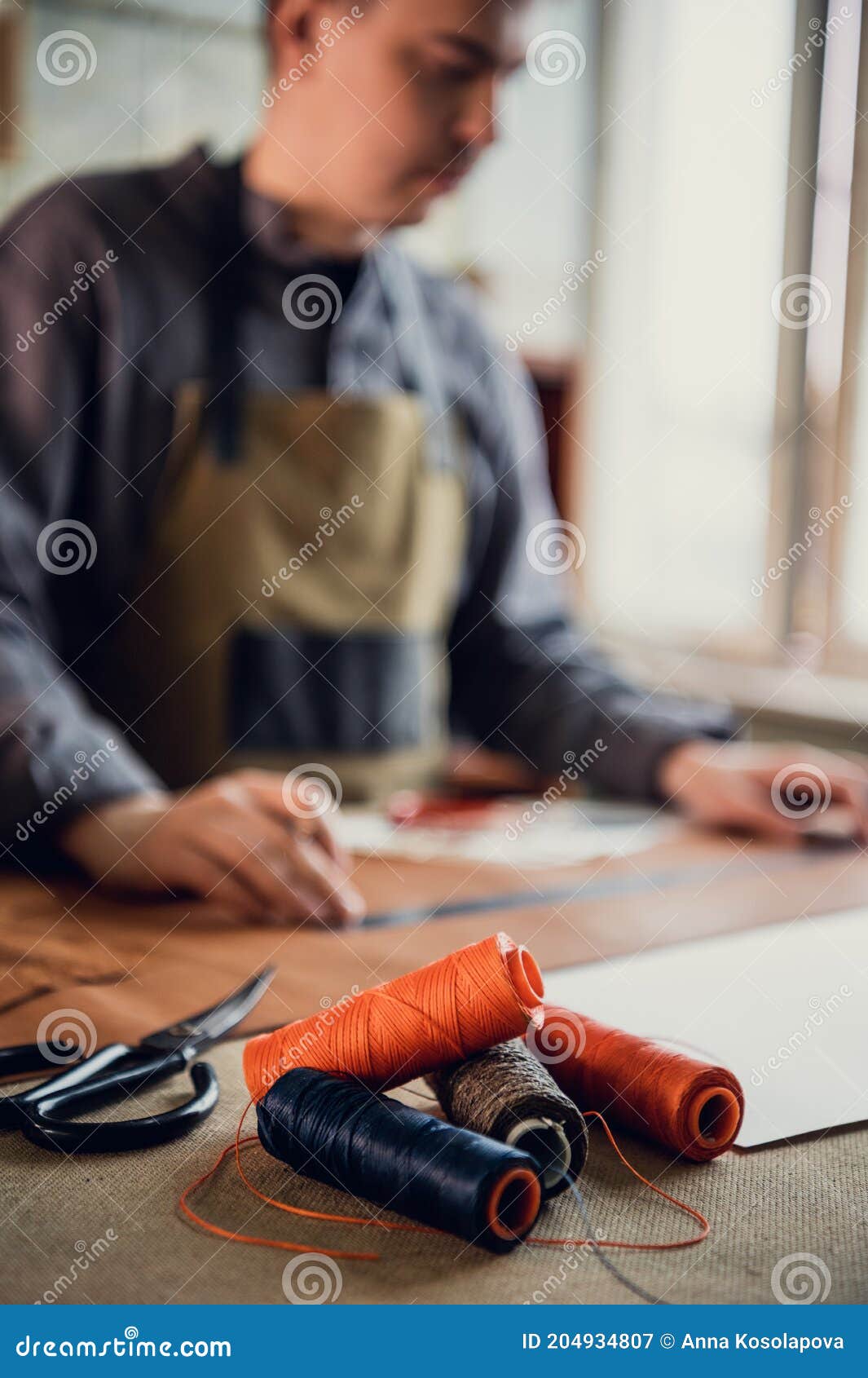 Old School Workshop of an Exclusive Shoemaker. Spools of Thread on the ...