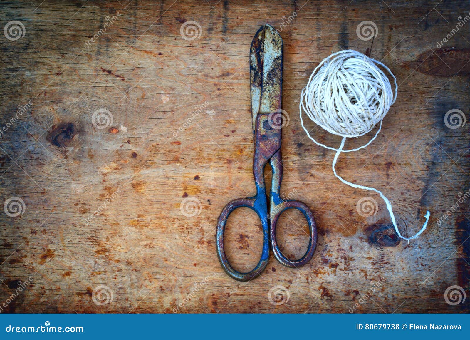 Old Scissors and a Ball of Twine on the Old Background, Top View Stock ...