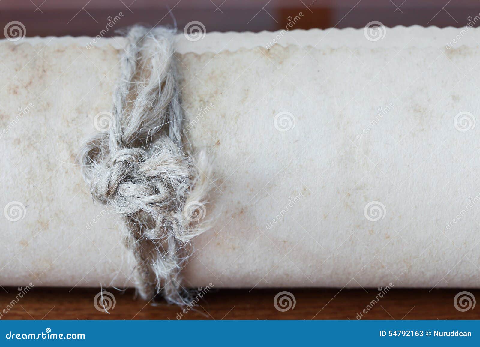 Old Scroll Paper on Wooden Background. Close Up of Rope Stock Image ...