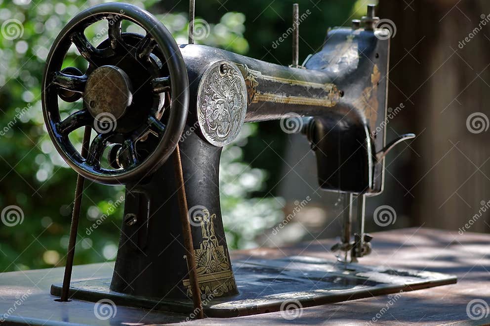 Old sewing-machine stock image. Image of material, black - 42467639
