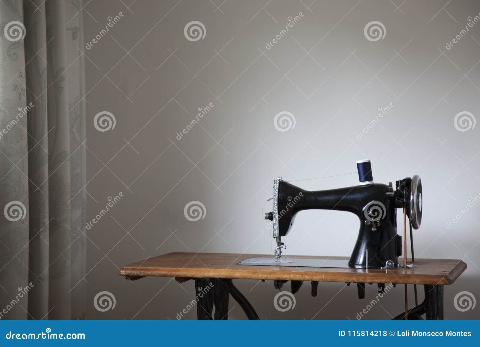 Old Sewing Machine in Front of a White Wall Stock Photo - Image of ...