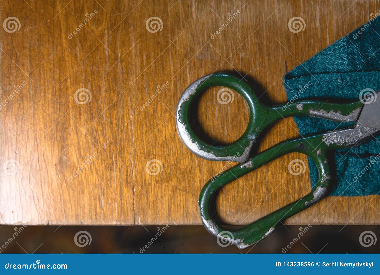 Old Sewing Machine with Scissors, on a Old Grungy Work Table. Tailor`s ...