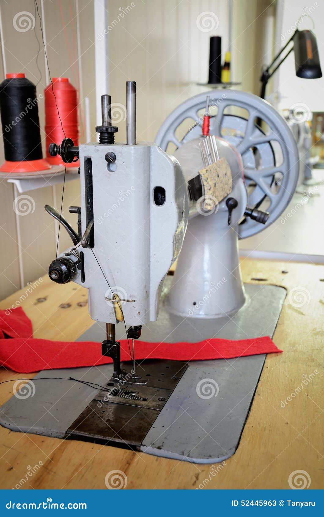 Old Sewing Machine in the Sewing Studio. Vertical Stock Image - Image ...