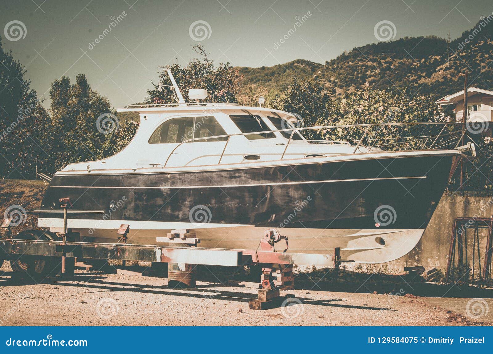 Old, Shabby Boat with a Trailer in the Backyard. Stock Image - Image of ...