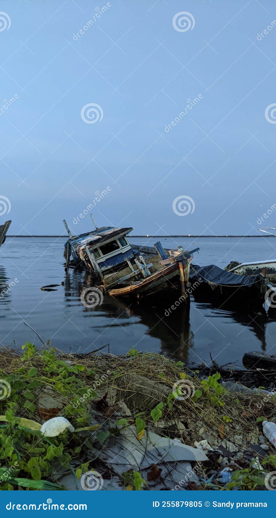 Old ship stranded stock image. Image of water, clouds - 255879805