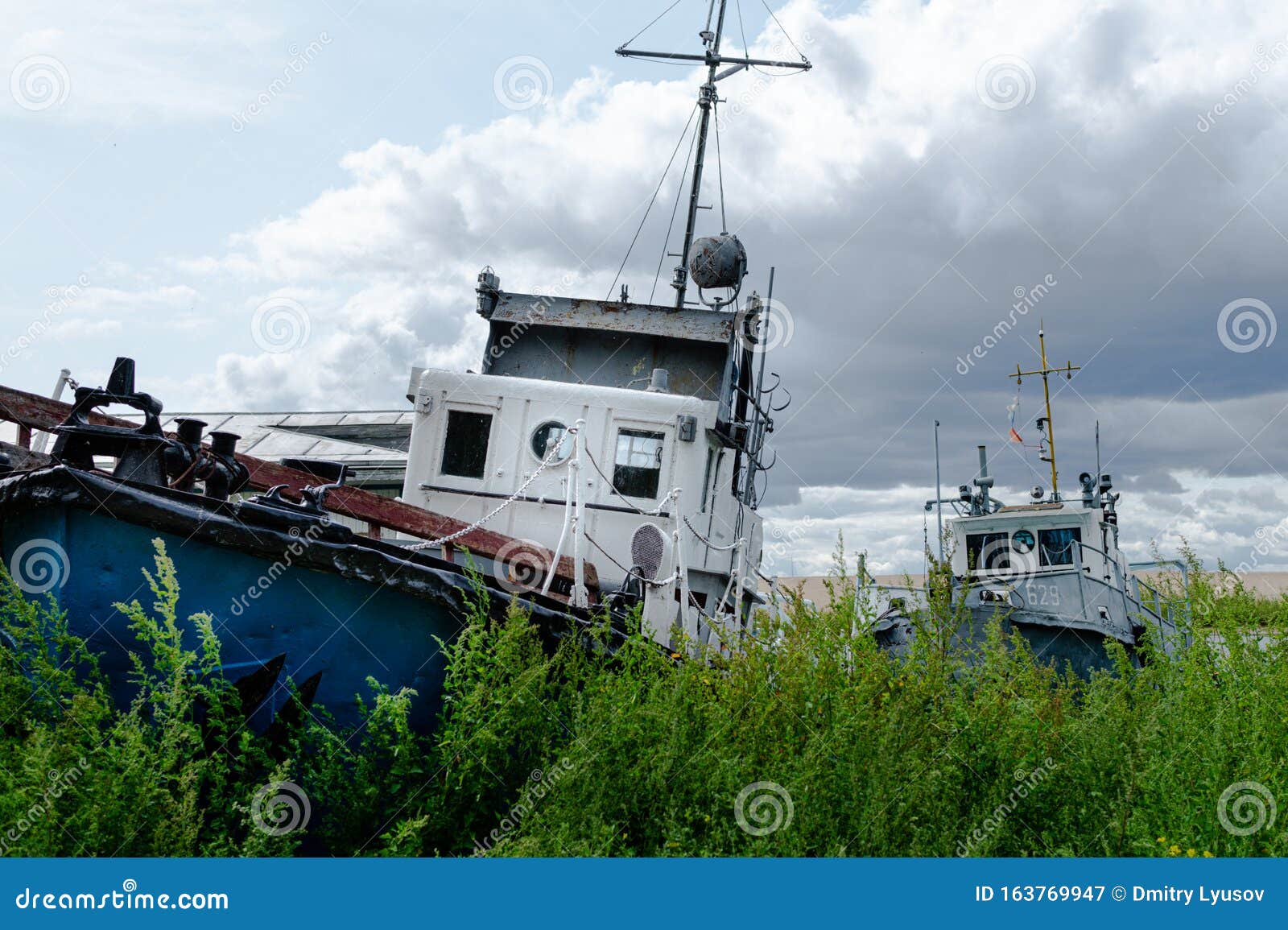 Old Ships Stand on Land in a Thicket of Grass Stock Image - Image of ...