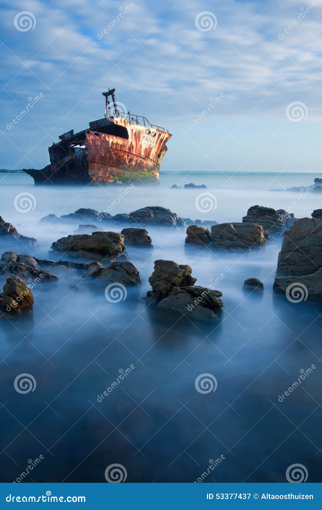 Old Shipwreck Long Exposure on Rocks at Sunset Stock Image - Image of ...