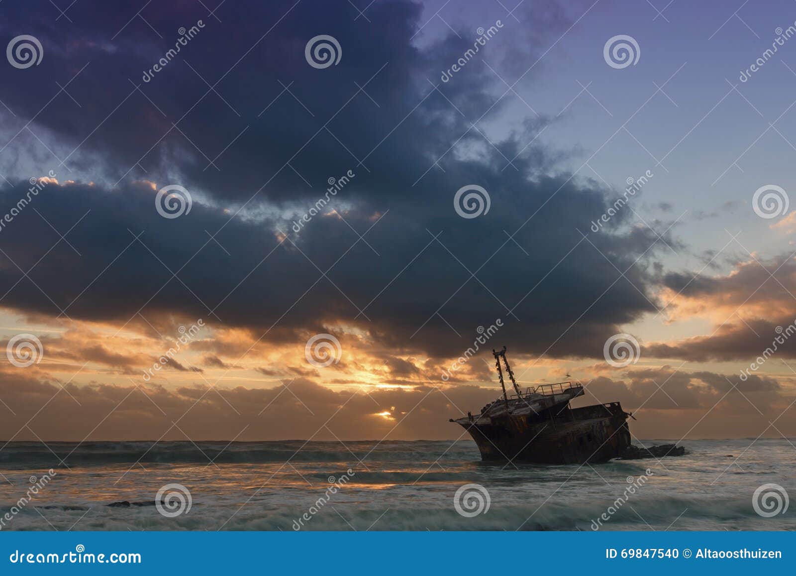 Old Shipwreck Long Exposure on the Rocks Sunset Stock Photo - Image of ...