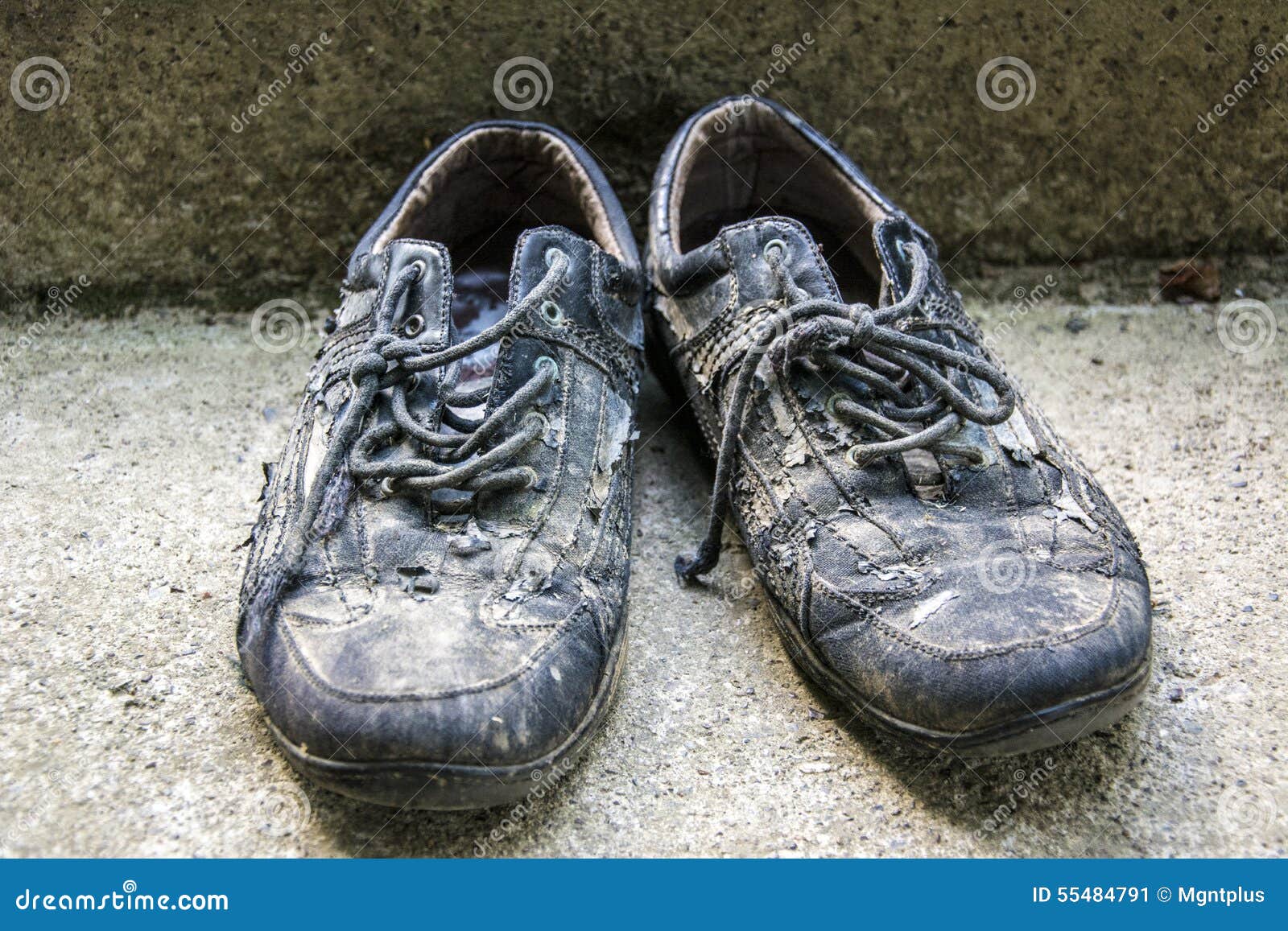Old shoes on concrete stock image. Image of shoelaces - 55484791