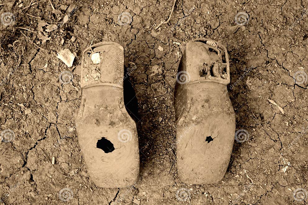Old shoes with holes stock photo. Image of hole, boots - 7727380