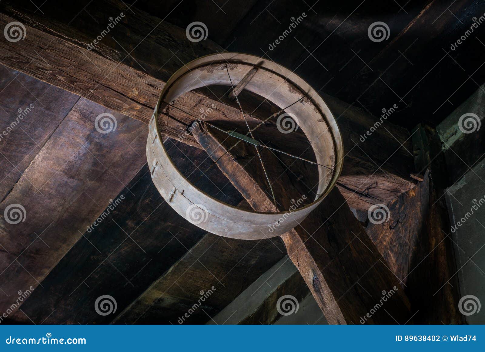 Old Sieve on the Ceiling in a Rustic Barn Stock Photo - Image of dark ...