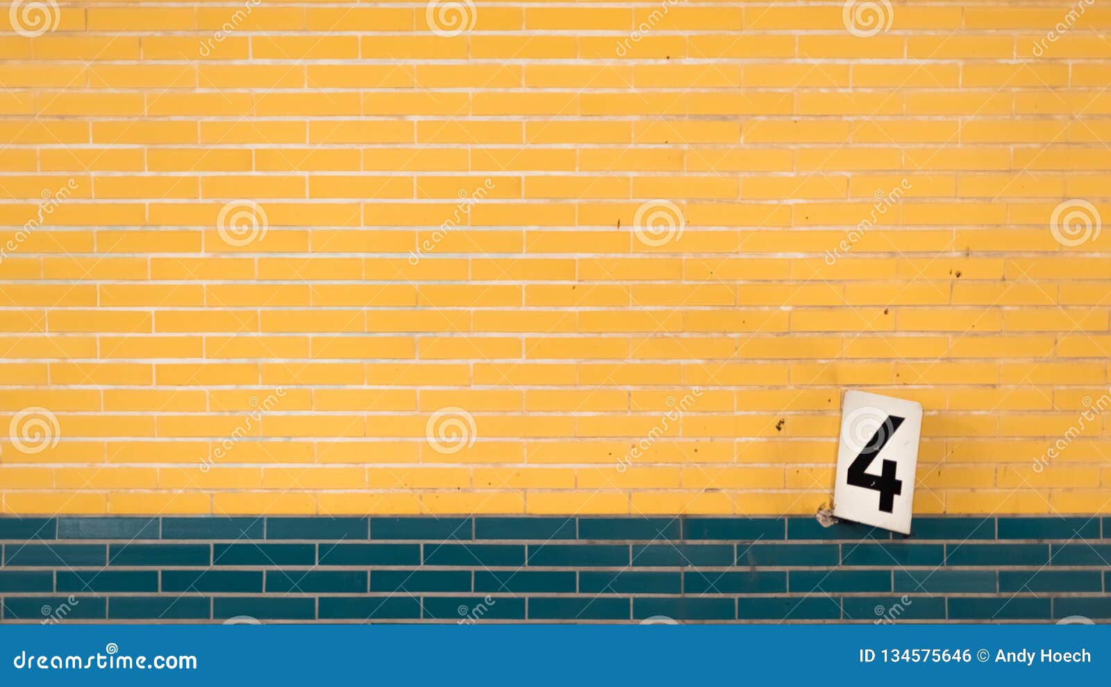 The Sign Number Four on a Tiled Yellow Wall Stock Photo - Image of ...