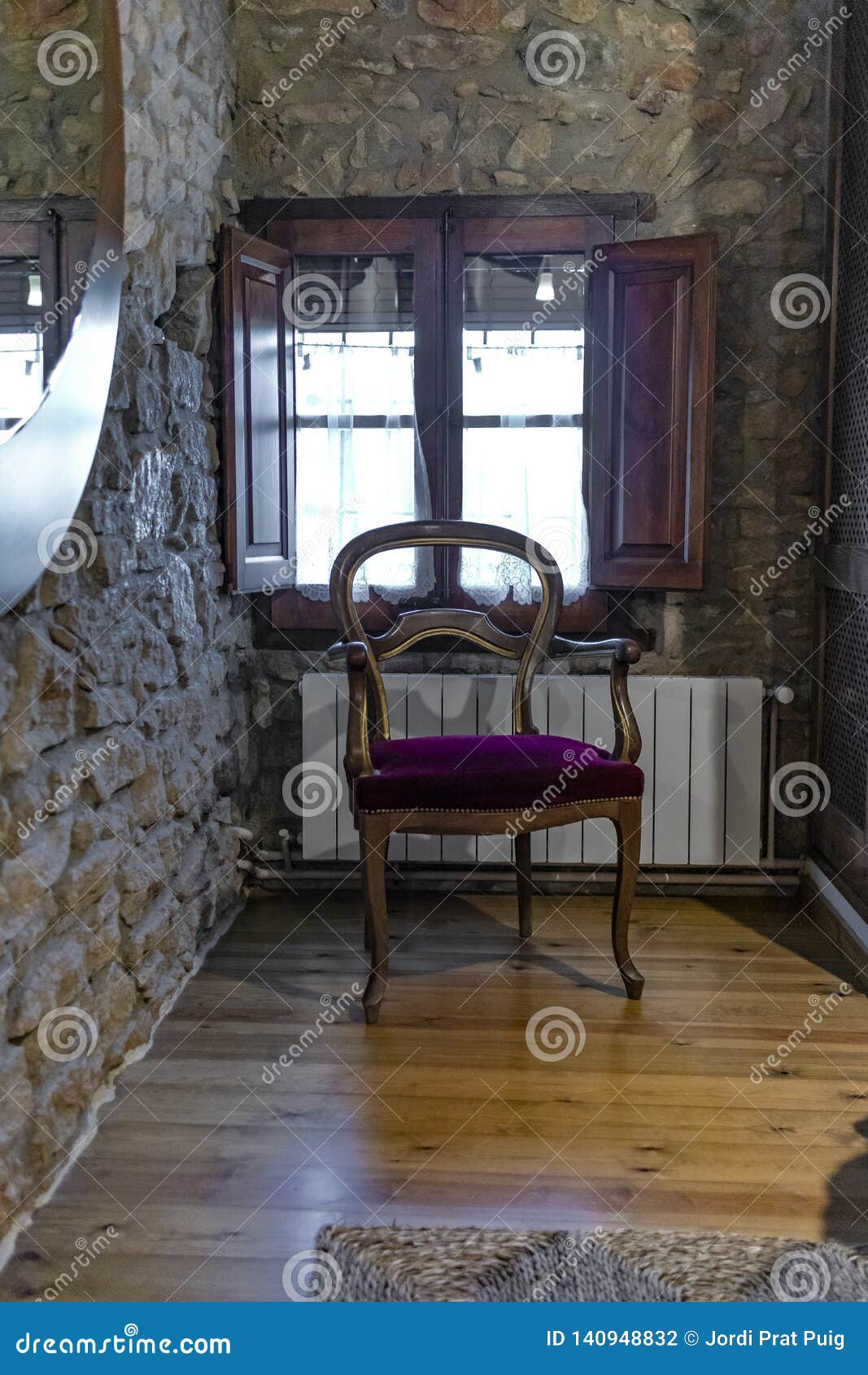 Old Sitting Chair on an Interior Old Cobble Stone House Stock Photo ...