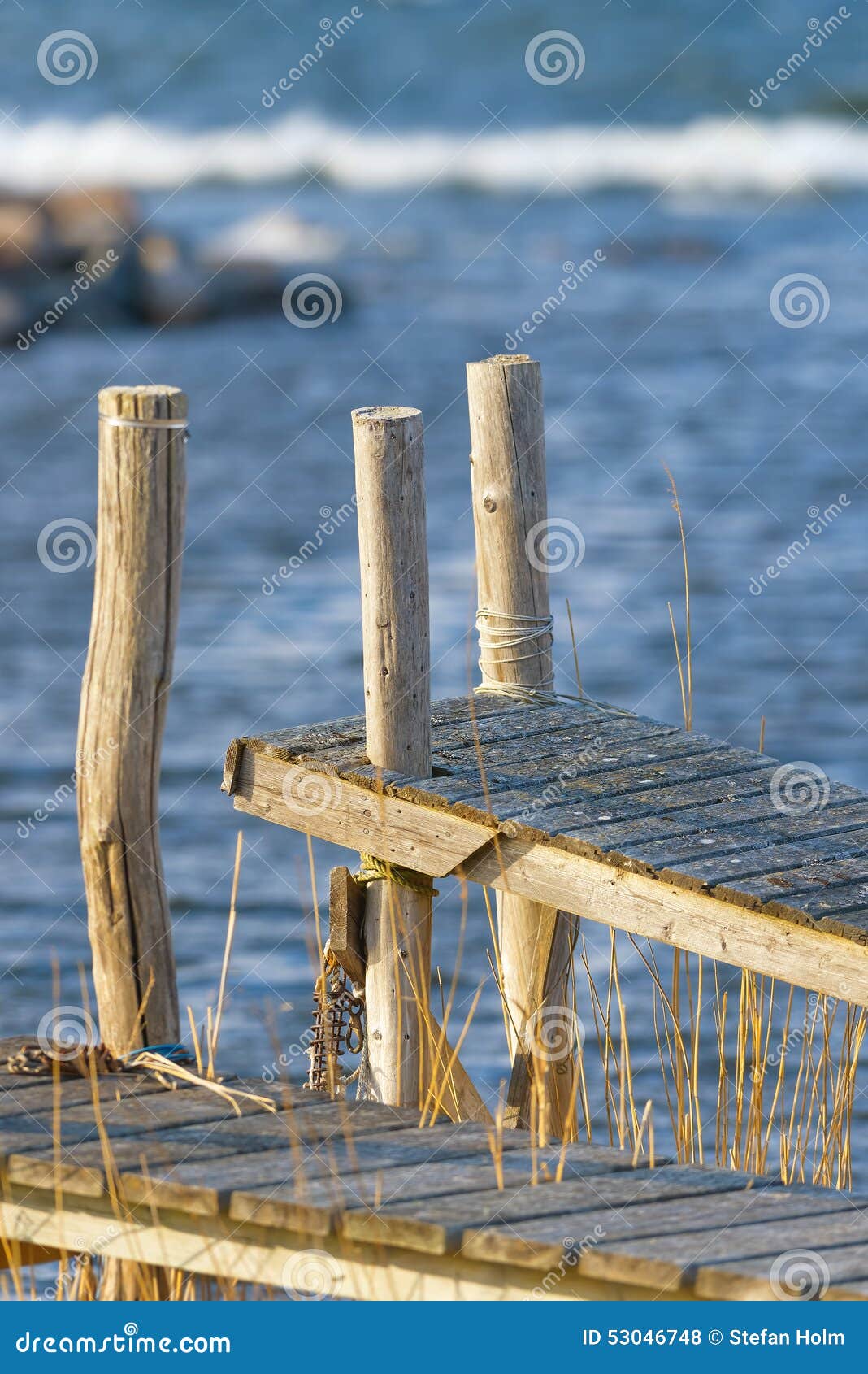 Old Small Jetty at Swedish Coastline during Afternoon Sun Stock Photo ...