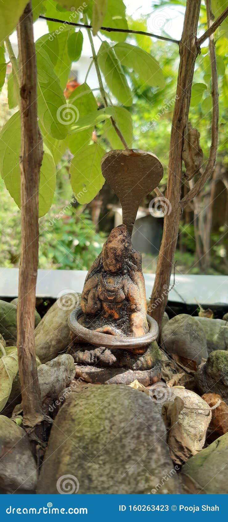 A Small Lord Shiva Statue At The Roof Of One Of Many Hindu Temples In ...