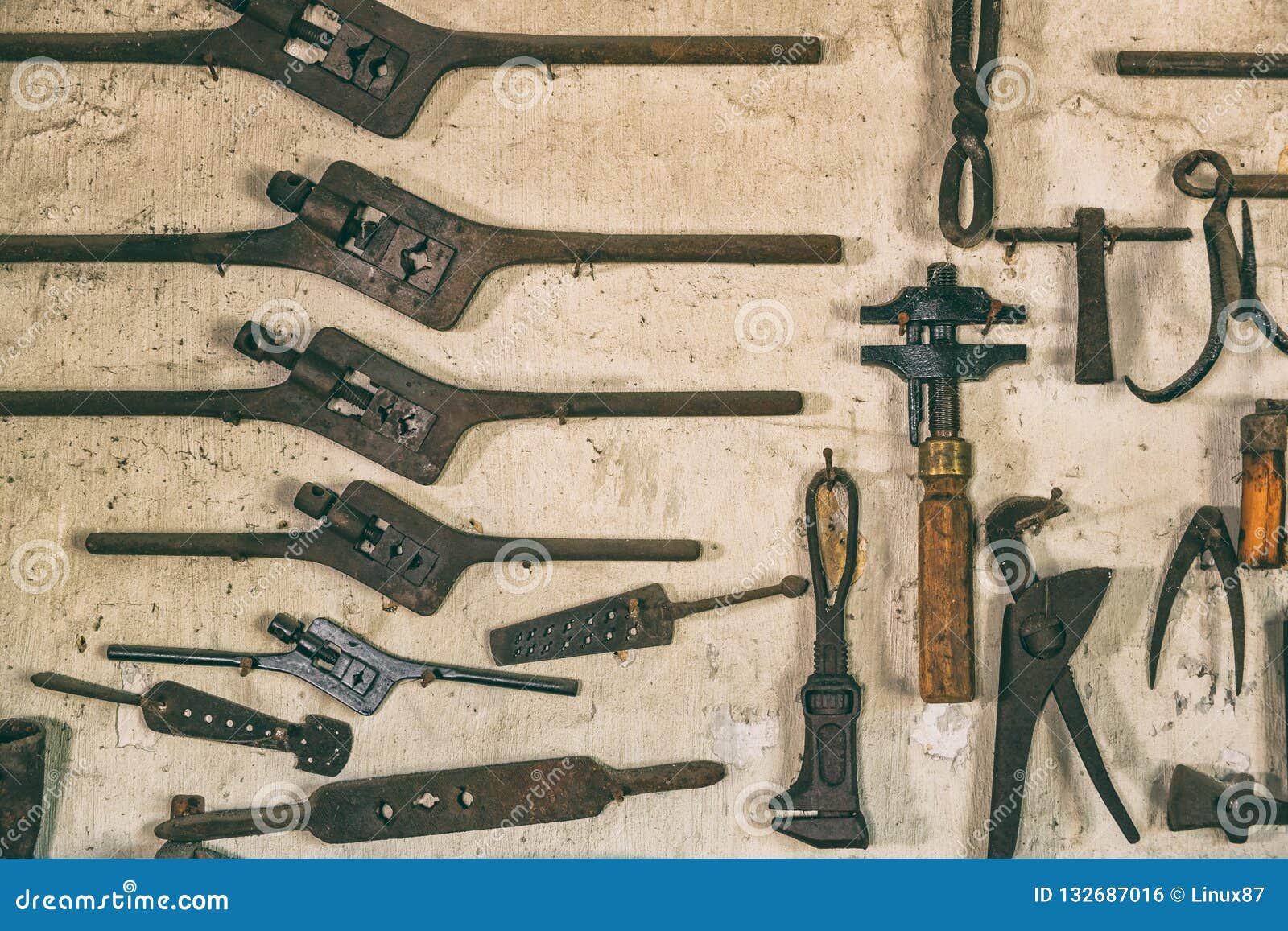 Smithy tools on the wall stock photo. Image of blacksmith - 132687016