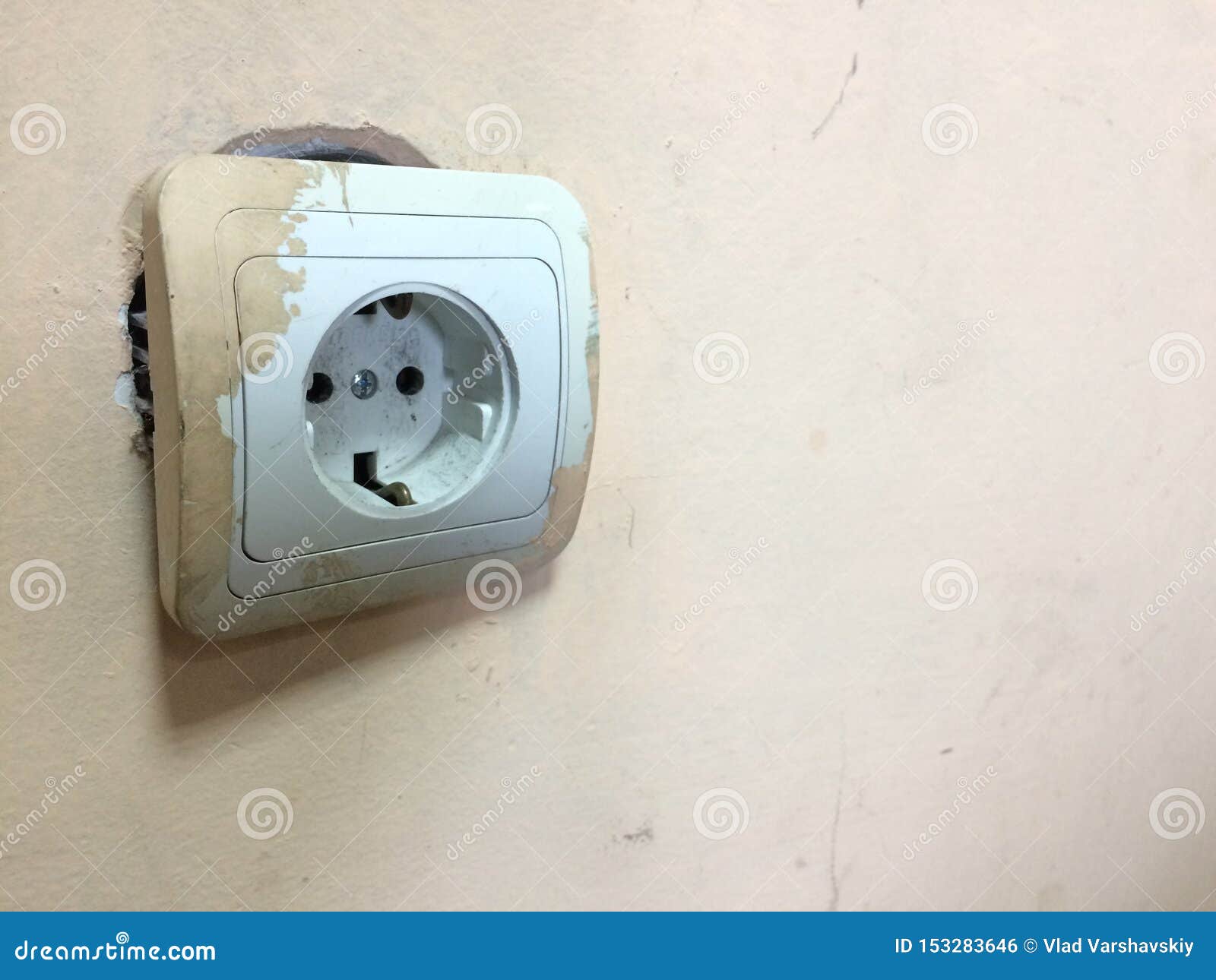Old Socket Broken Down into a Plasterboard Wall. Not Safe Editorial ...