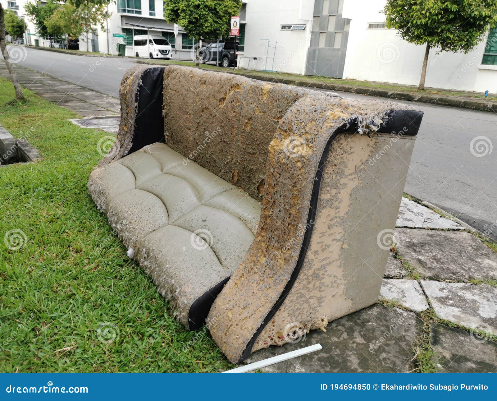 Old Sofa at Apartment Garbage Collection Area by the Road Side. Stock ...