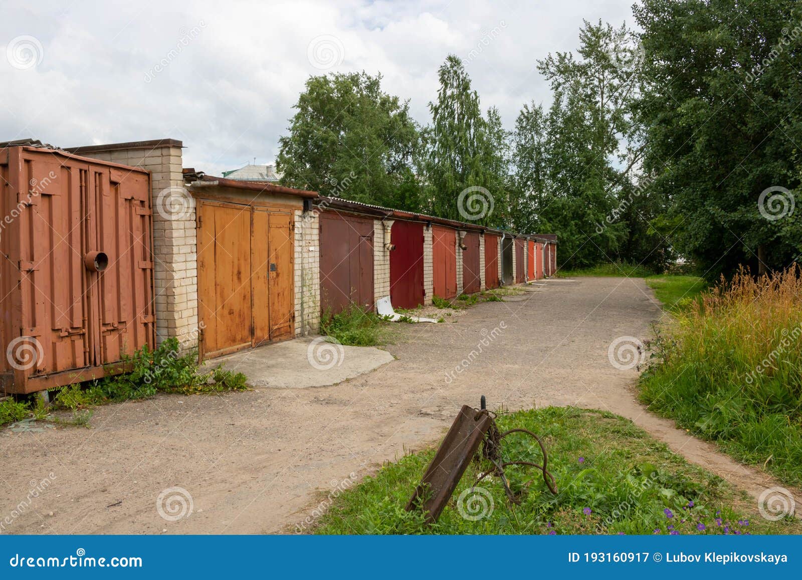 The Old Soviet Brick Garage with Brown Doors Stock Image - Image of ...