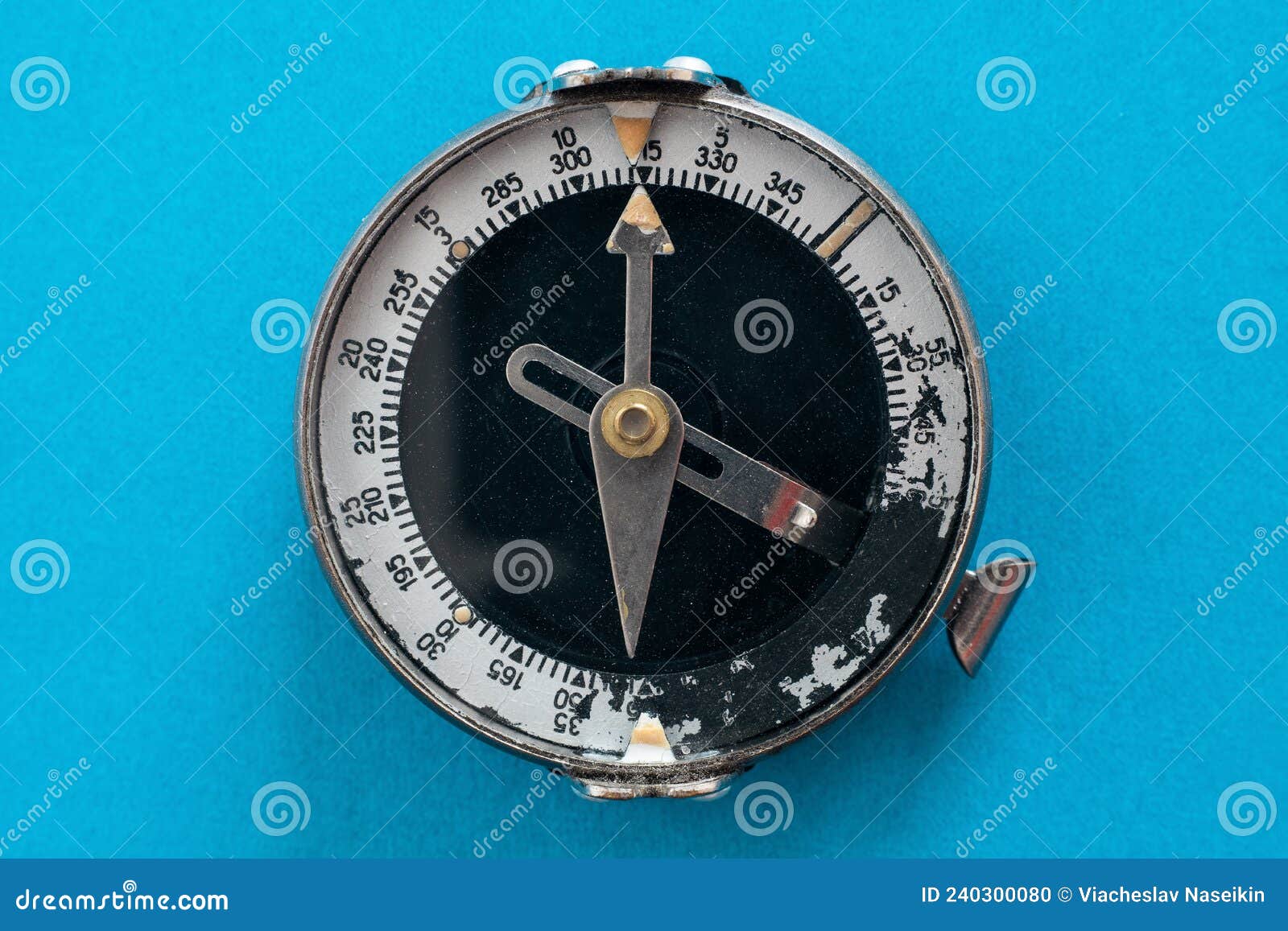 Old Soviet Compass Close-up on a Blue Background Top View Isolated ...
