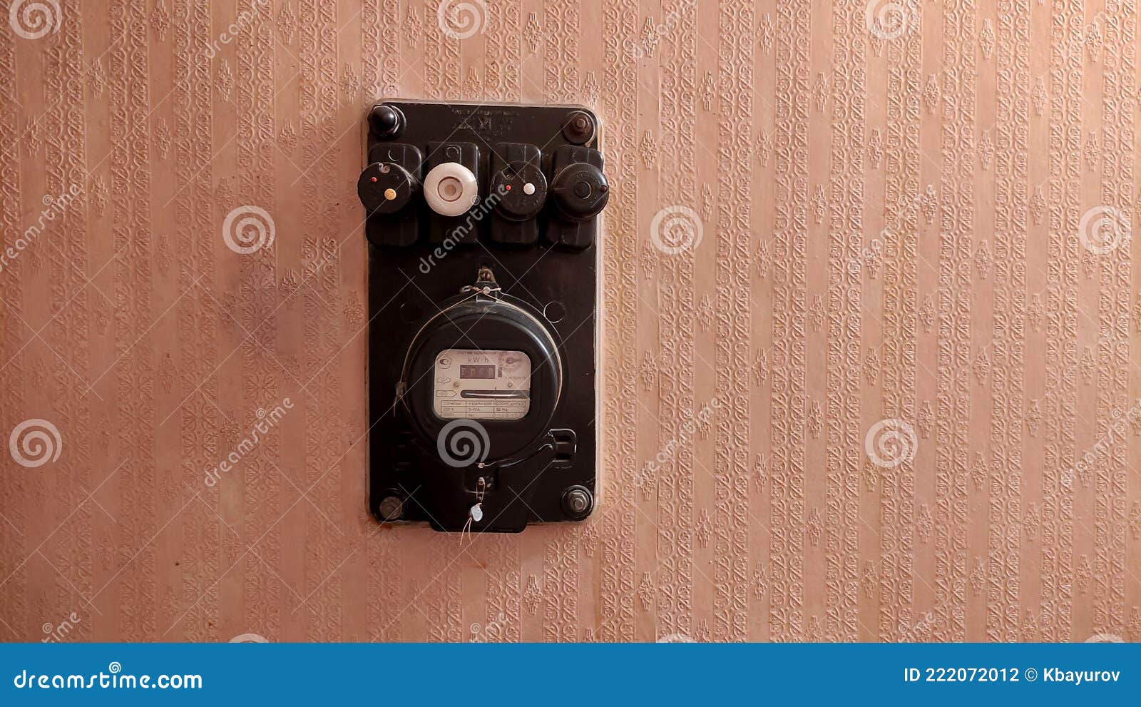Old Soviet Electric Meter on an Empty Dirty Wall with Yellow Wallpaper ...