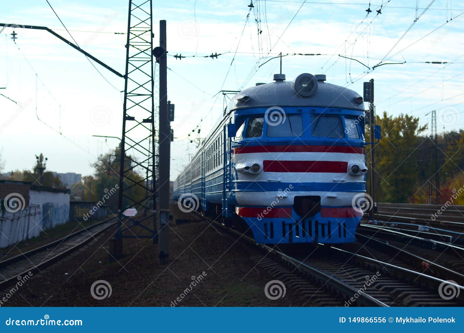 Old Soviet Electric Train with Outdated Design Moving by Rail Stock ...