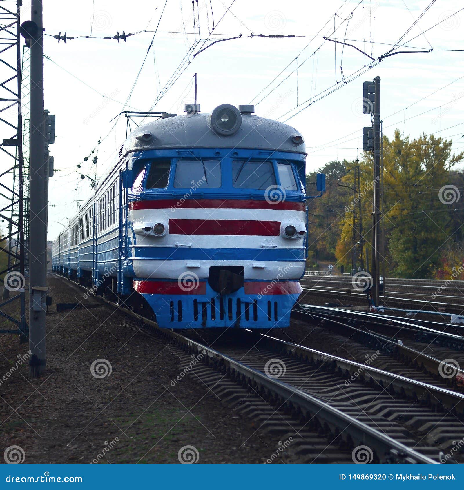 Old Soviet Electric Train with Outdated Design Moving by Rail Stock ...