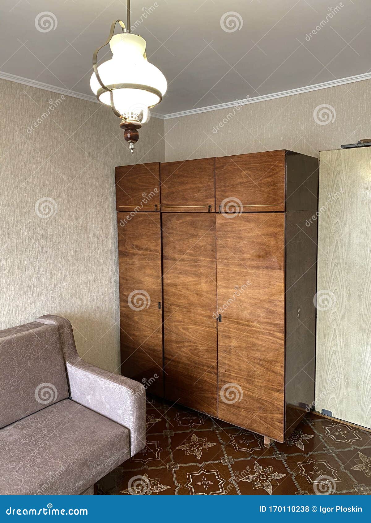Old Soviet Sofa and Wooden Wardrobe in Soviet Apartment Stock Photo ...