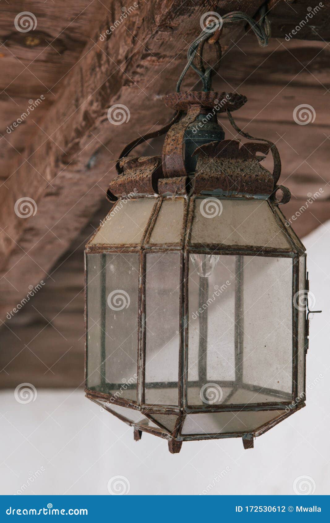 Old Spanish Light Fixture is Rusty and Needs Restoration Stock Photo ...