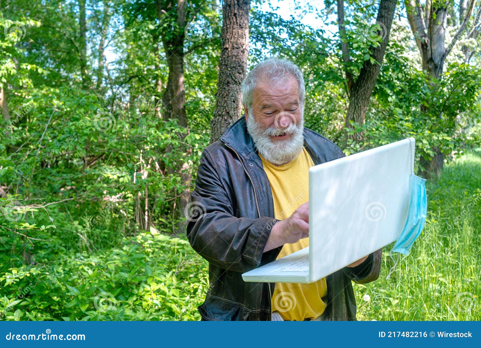 Old Spanish Man with a White Beard and Happy Face Learning To Use a ...