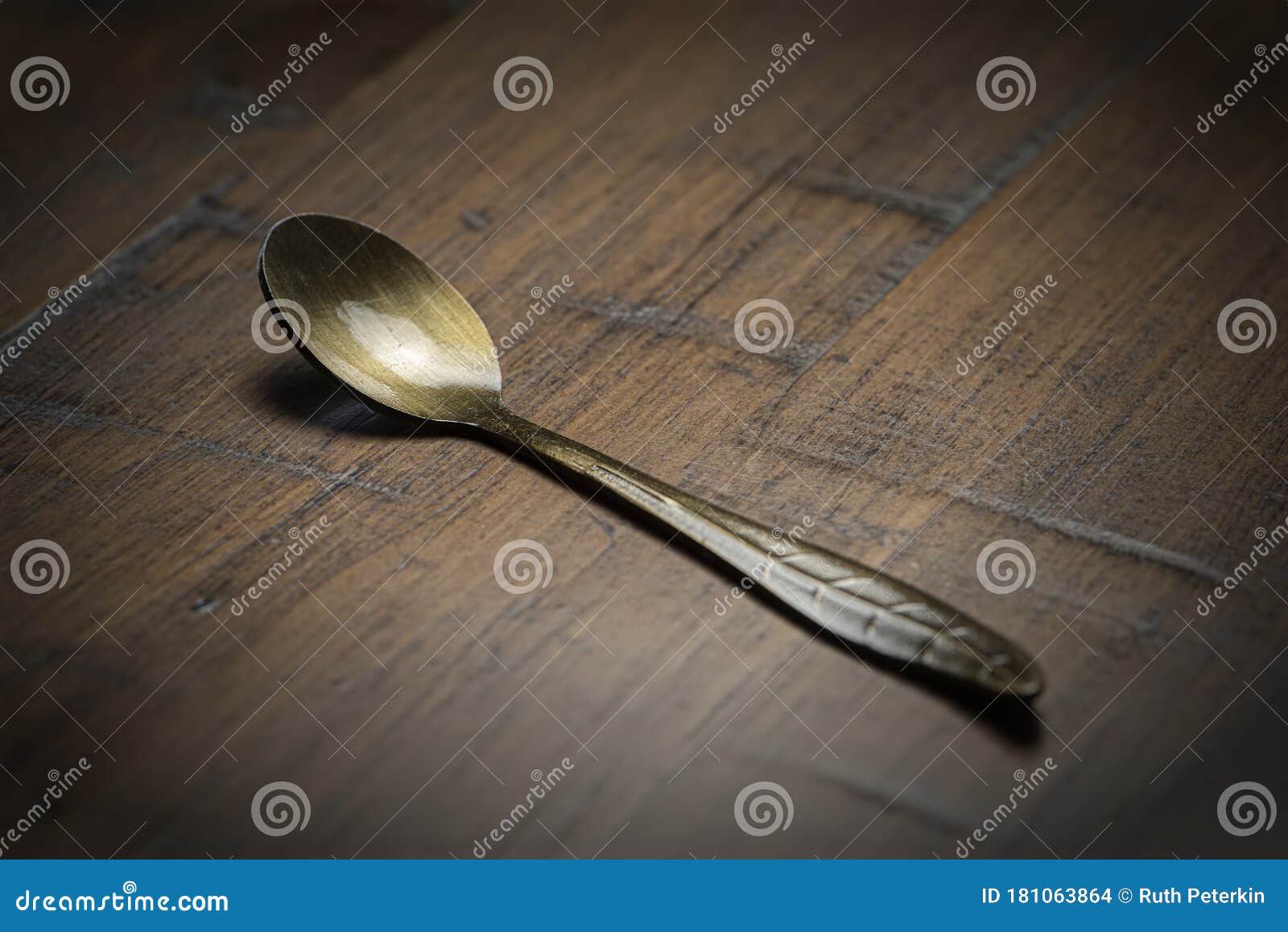 Old Spoon on Wooden Table stock photo. Image of flatware - 181063864