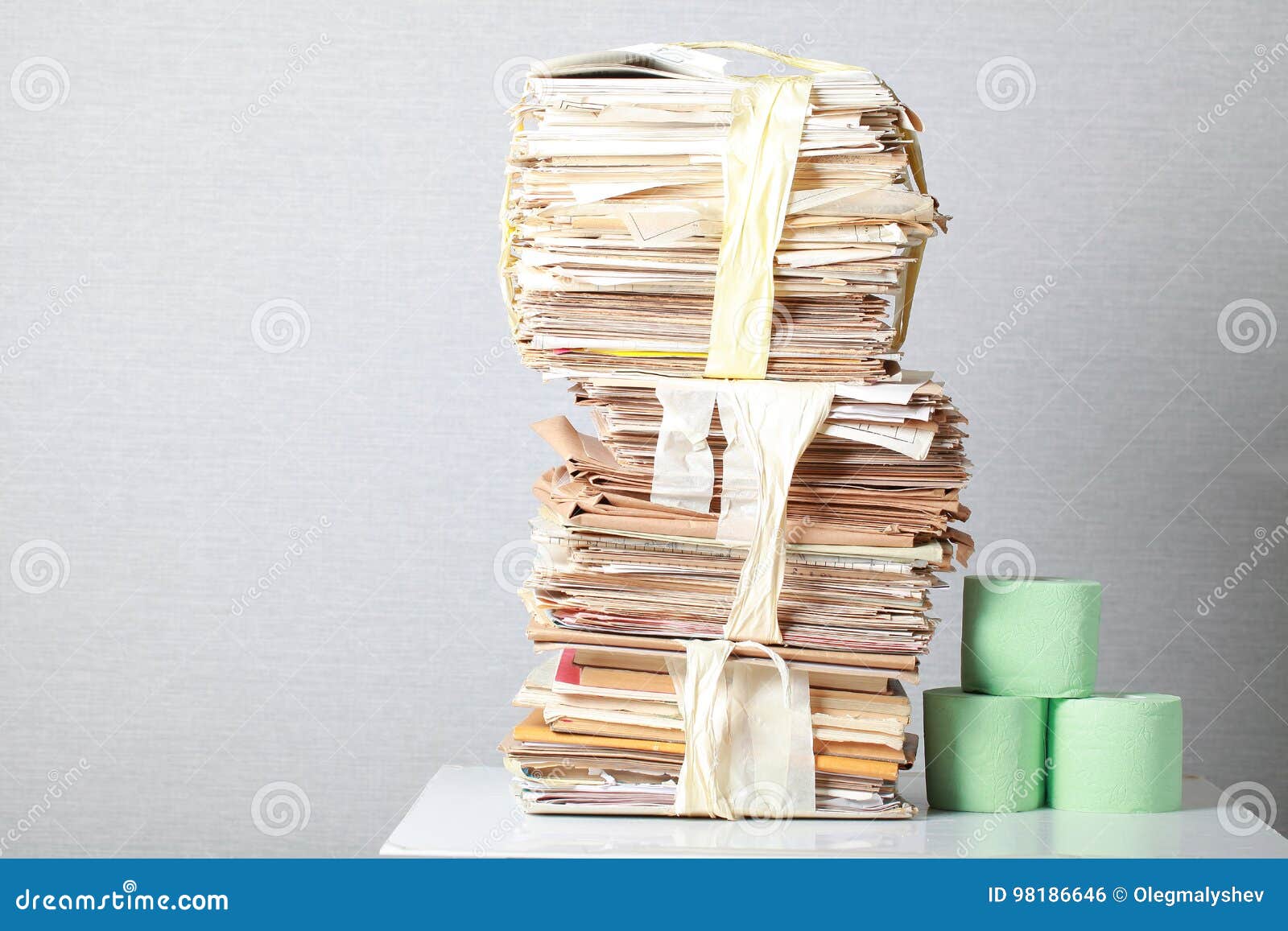 Old Stack of Waste Paper and a Roll of Toilet Paper Stock Photo - Image ...