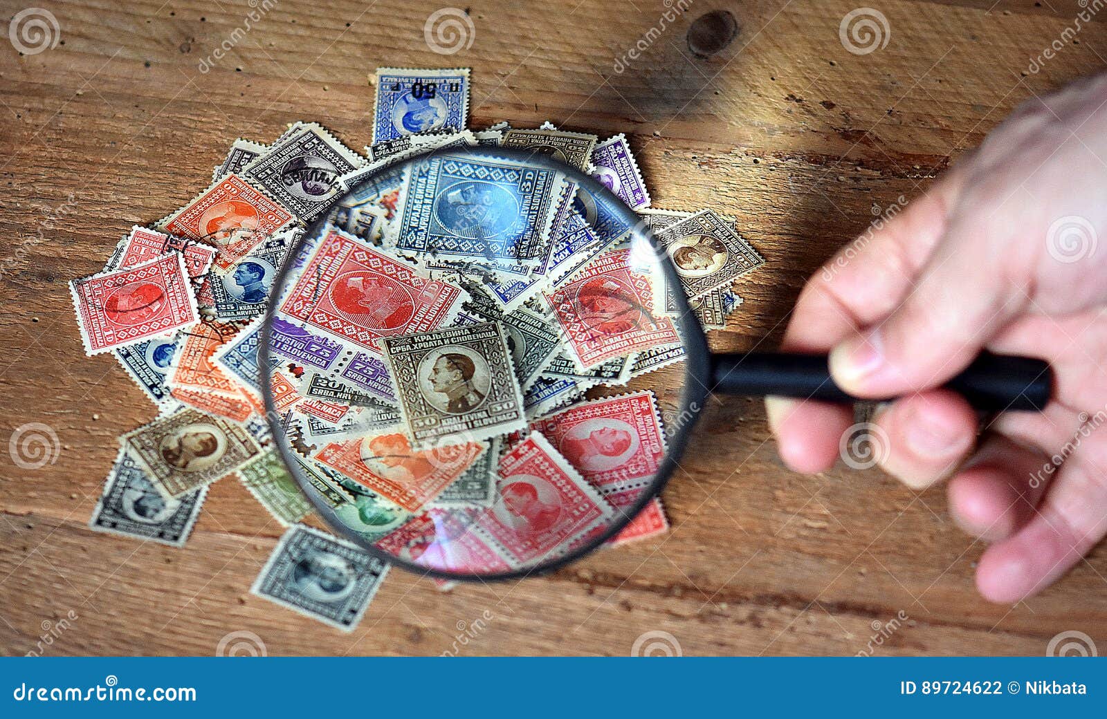 Old Stamps and Magnifying Glass Editorial Photography - Image of ...