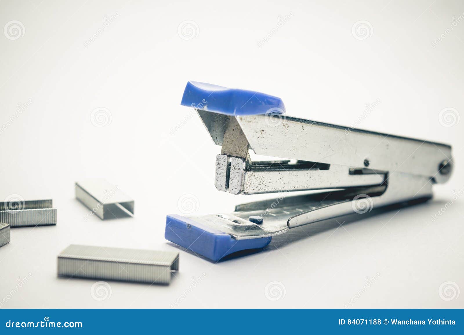 Old stappler on paper stock photo. Image of closeup, clip - 84071188