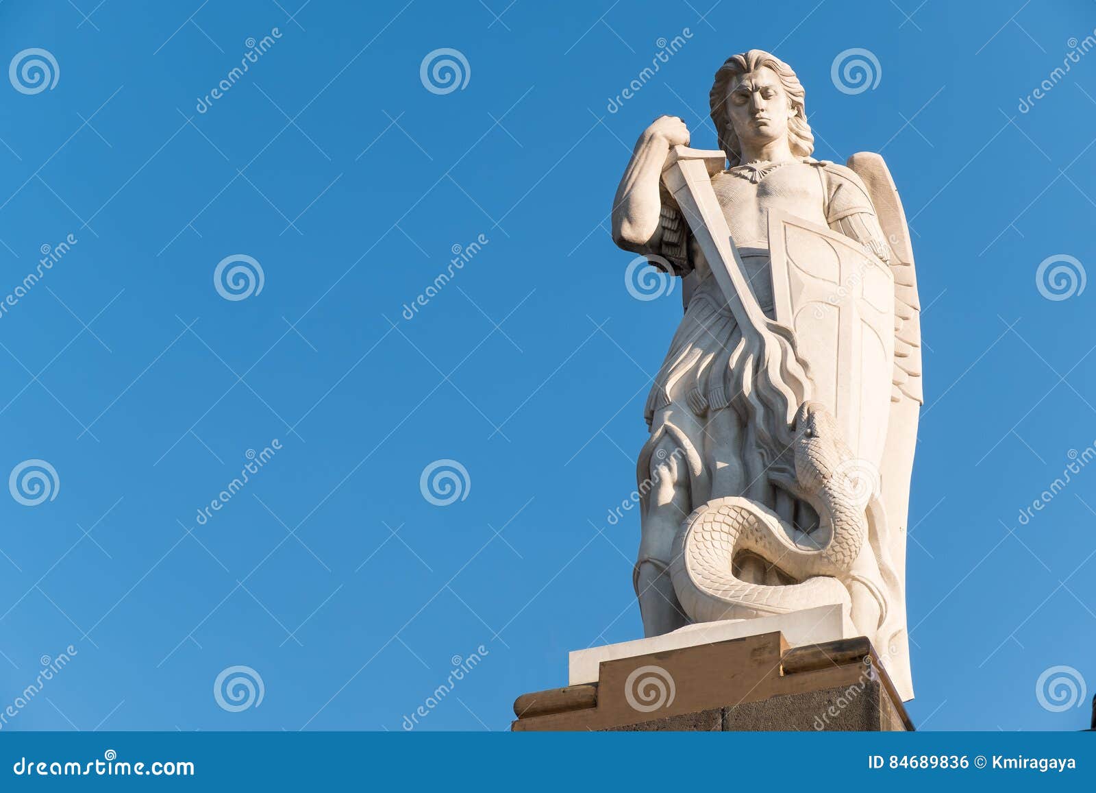 Old Statue Of The Archangel Saint Michael Fighting The Dragon Royalty ...