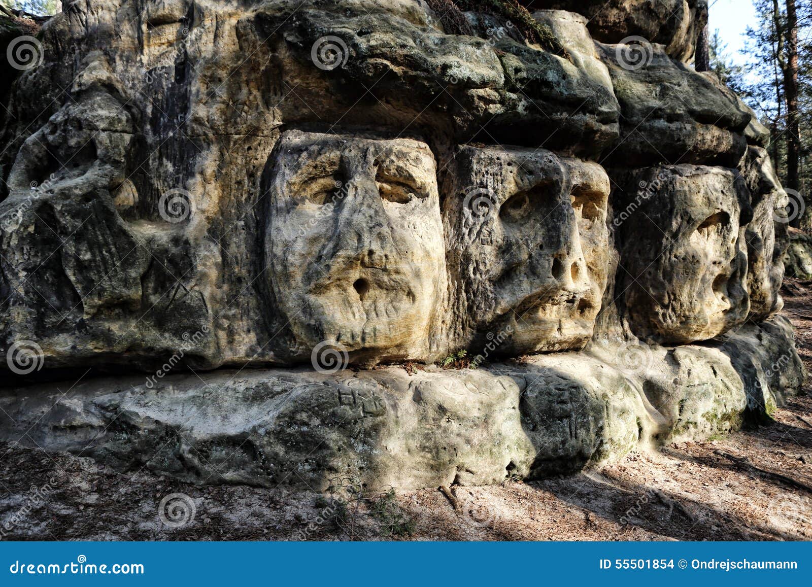 Old statues in the rock stock photo. Image of rock, shadow - 55501854