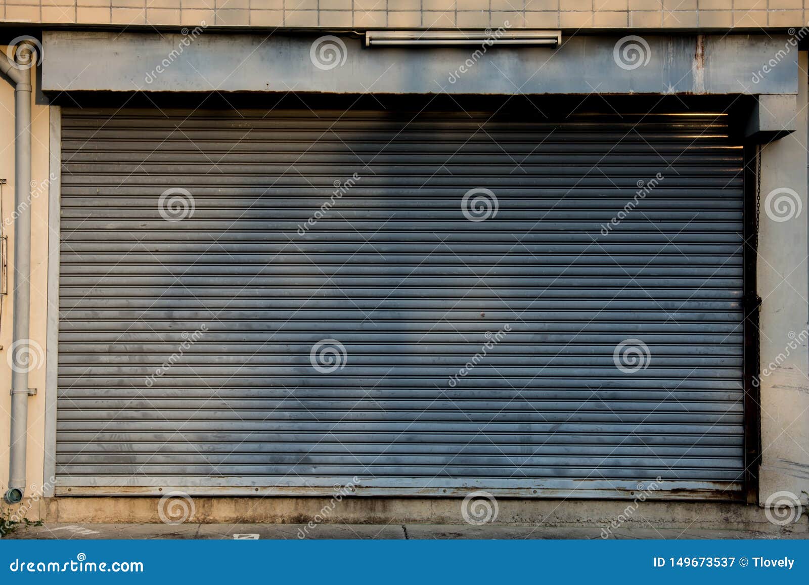 Old Steel Rolling Shutter with Wall Stock Image - Image of grass, board ...