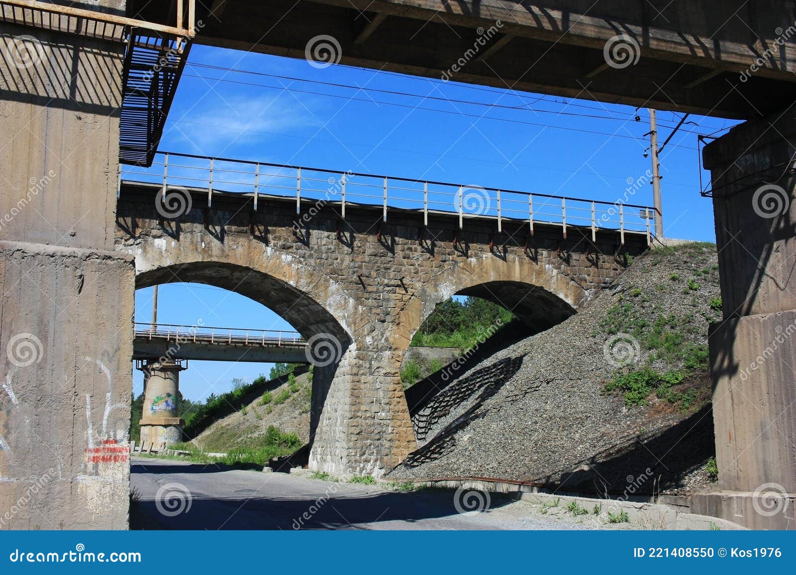 Old Stone Bridge Across the Road Stock Photo - Image of dirt, europe ...