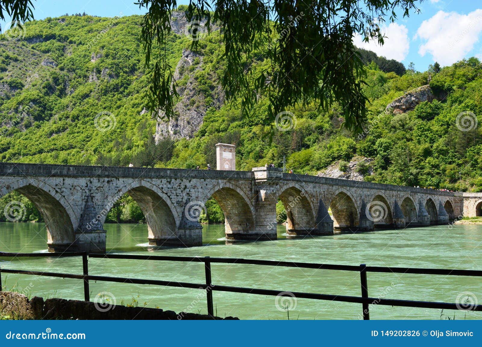 Stone bridge on the river stock photo. Image of river - 149202826