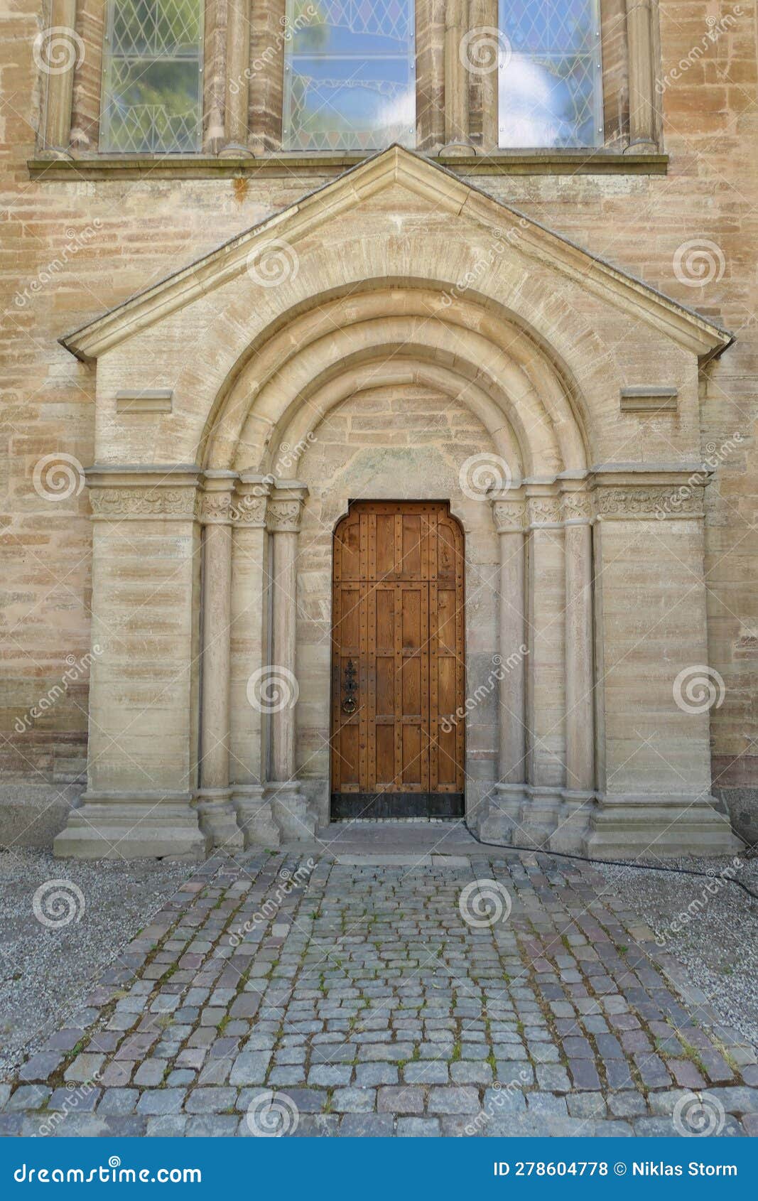 A Old Stone Building with a Gate Stock Photo - Image of building, house ...