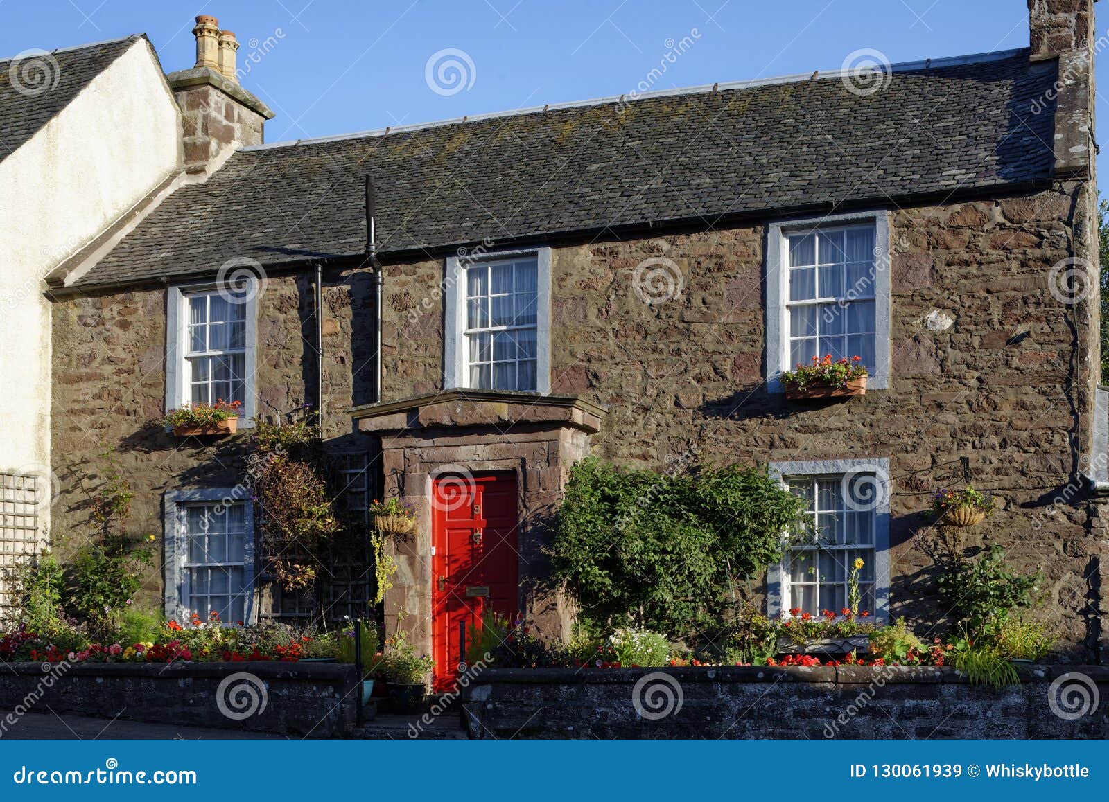 Old Stone Cottage stock image. Image of flowers, cottage - 130061939