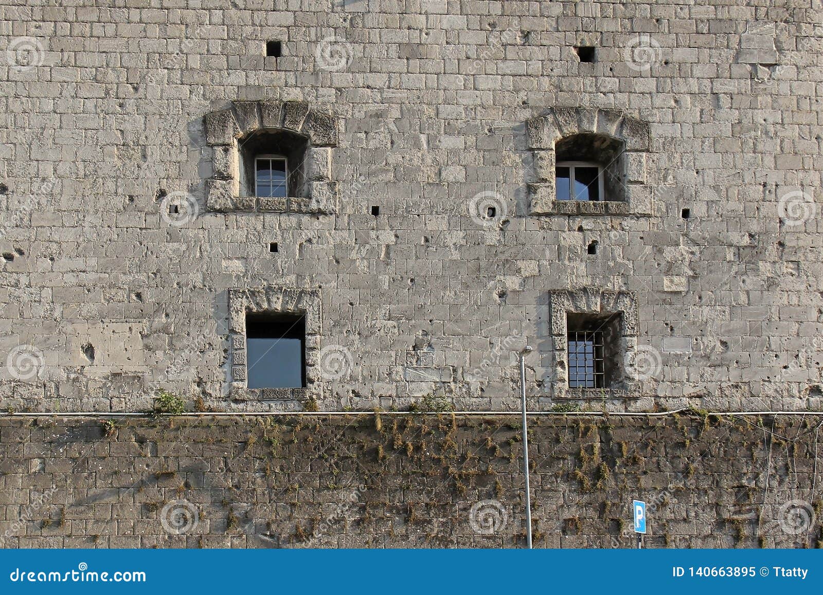 Old Stone Facade with Four Windows Stock Image - Image of gray ...
