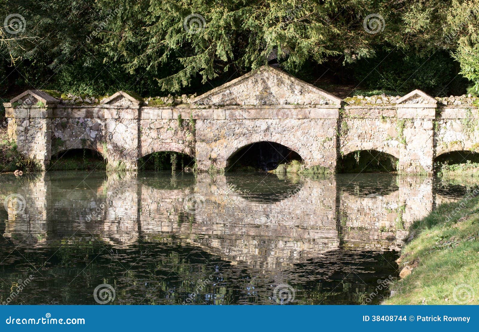 Old Stone Footbridge Reflected in River Stock Photo - Image of arches ...