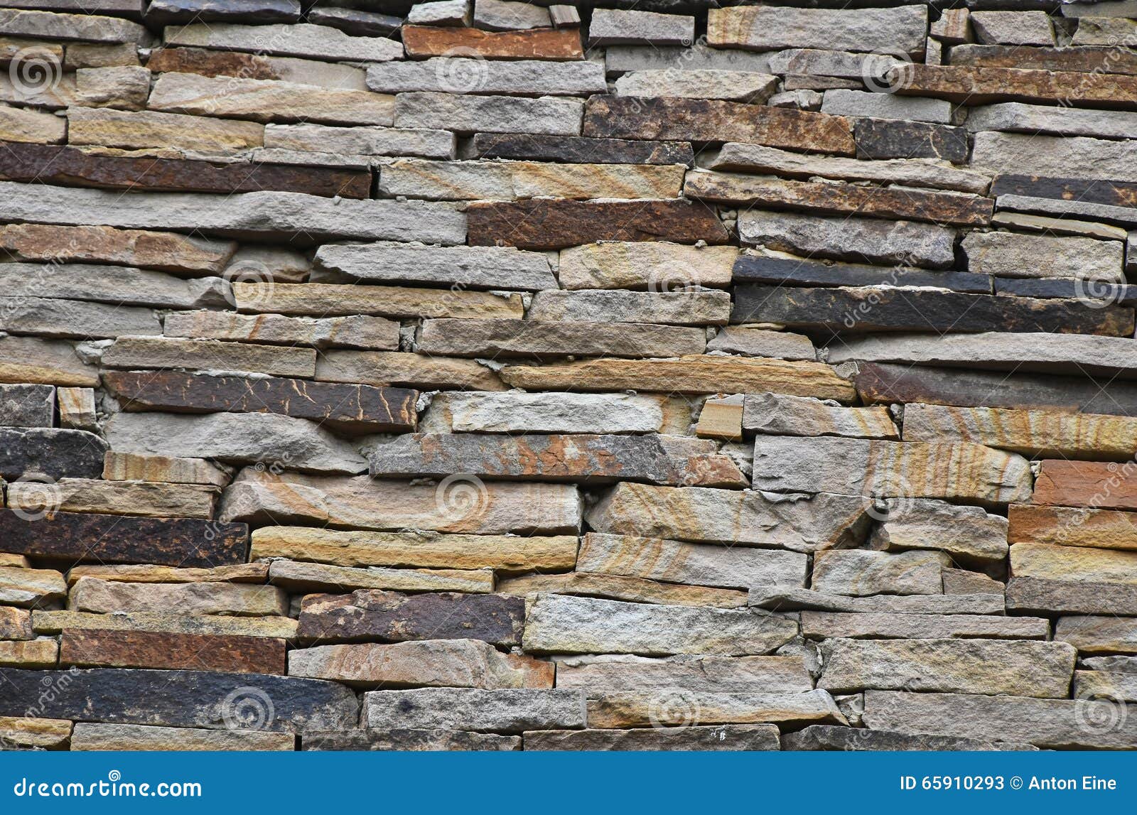 Old stone layered wall stock image. Image of structure - 65910293