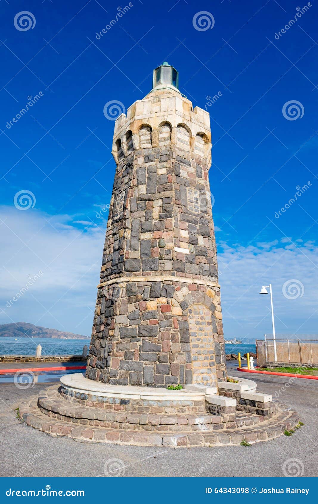 Old Stone Lighthouse stock photo. Image of tower, lighthouse - 64343098