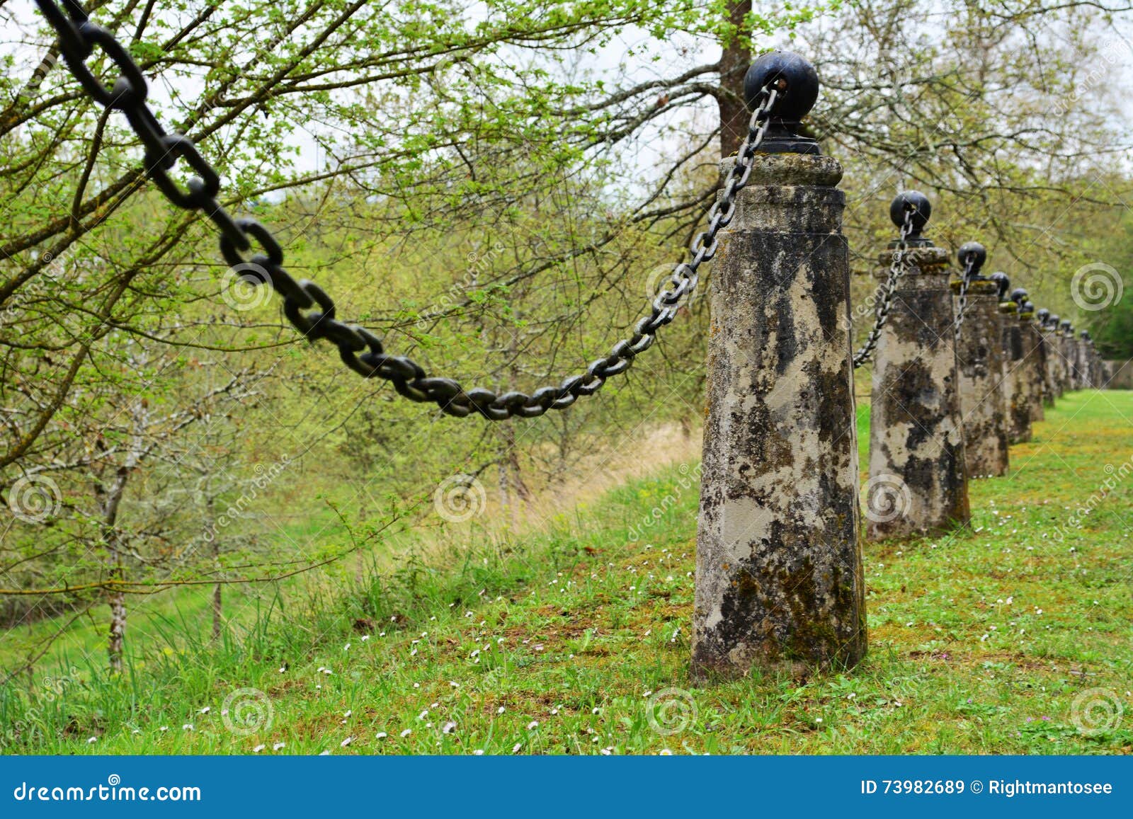 Old Stone Posts with an Iron Chain Link Fence Stock Image - Image of ...