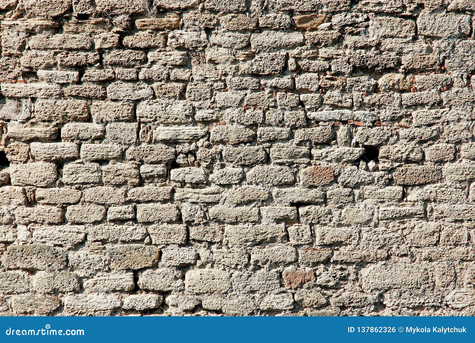 Old Stone Wall Built of Limestone Bricks Stock Photo - Image of stone ...