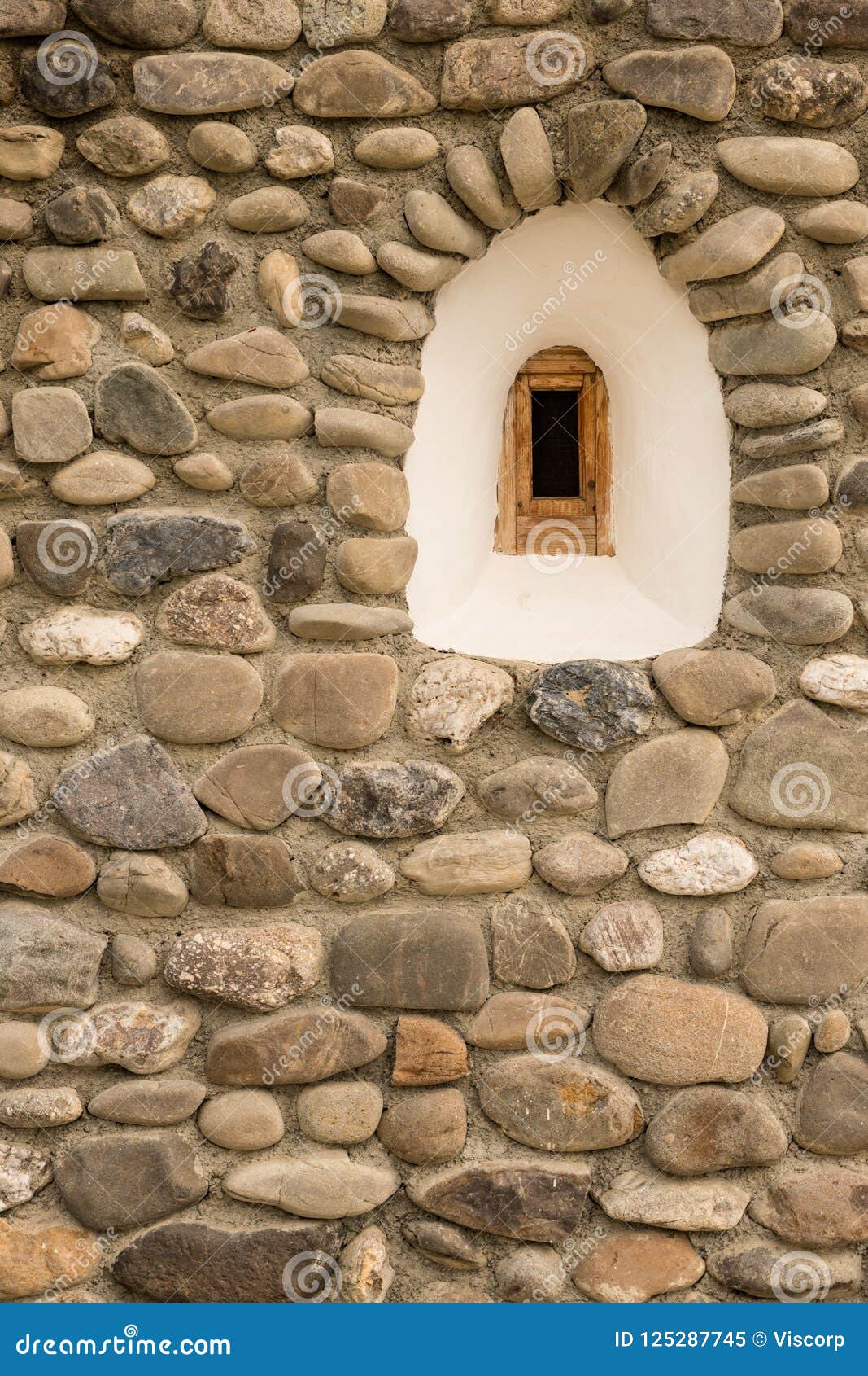 Old Round Stone Wall With Small Window Stock Image - Image of masonry ...