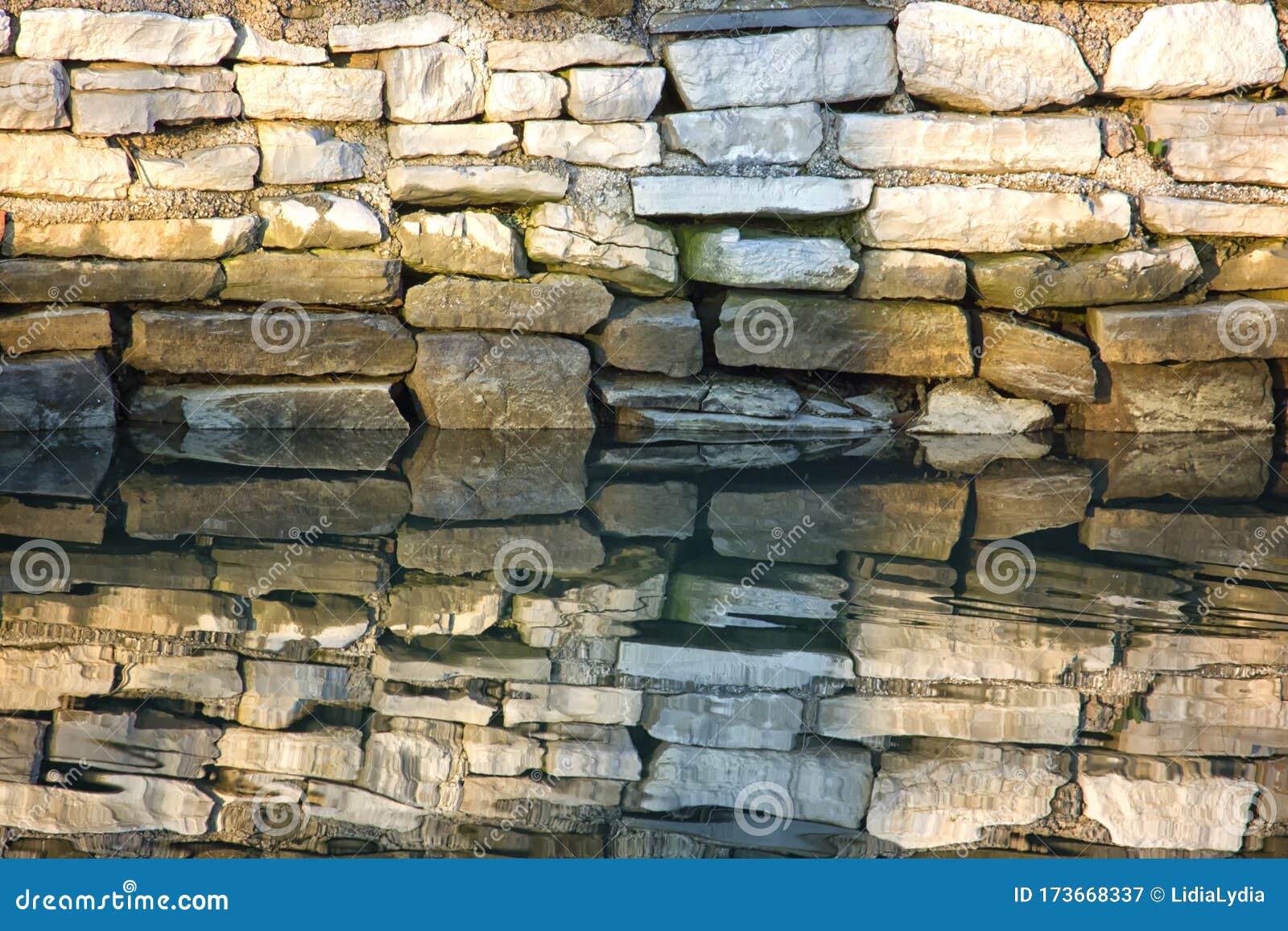 Stone Wall Reflection in Water Stock Image - Image of stones, brick ...