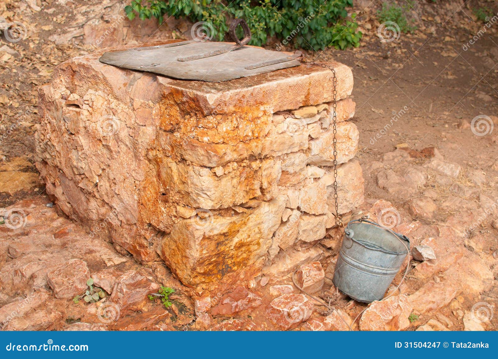 Old Stone Well In Traditional House Garden With A Niece And Flowers ...